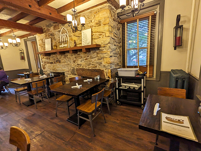 Where rustic meets comfort – exposed stone walls and wooden beams create the perfect backdrop for memorable meals.