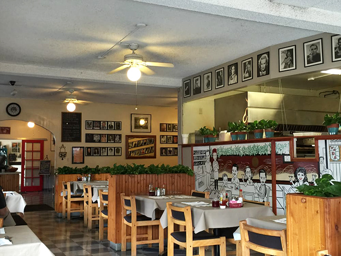 Hollywood history lines the walls while ceiling fans lazily spin overhead, creating the perfect backdrop for morning conversations and coffee refills.
