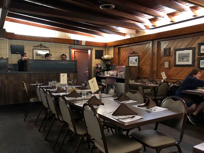 Wood-paneled comfort meets no-nonsense dining in this timeless steakhouse atmosphere that prioritizes substance over style.