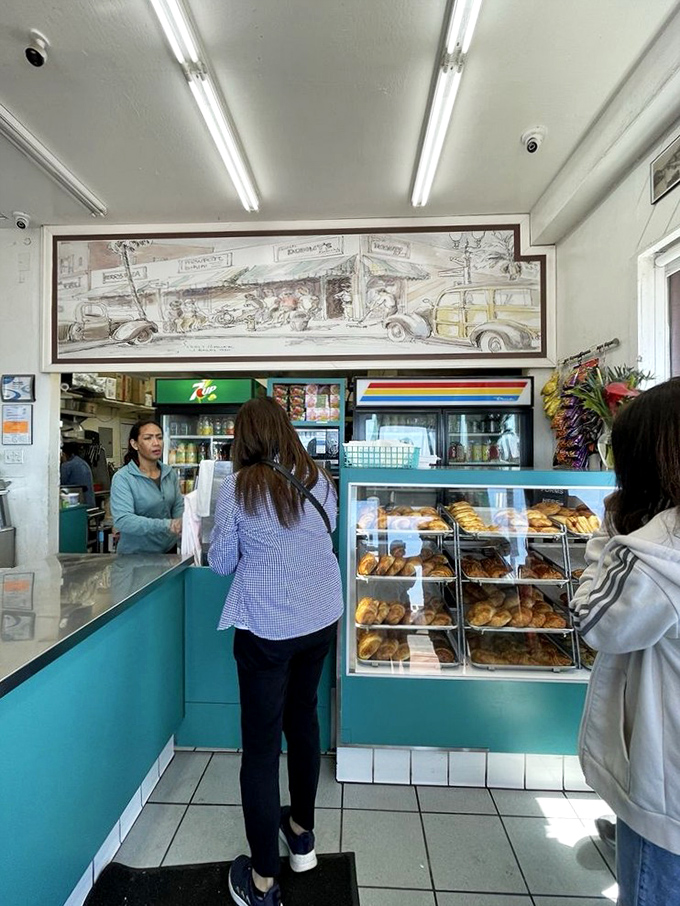 Inside, turquoise counters and no-nonsense display cases let you know this place means business—donut business, the most delicious kind there is.