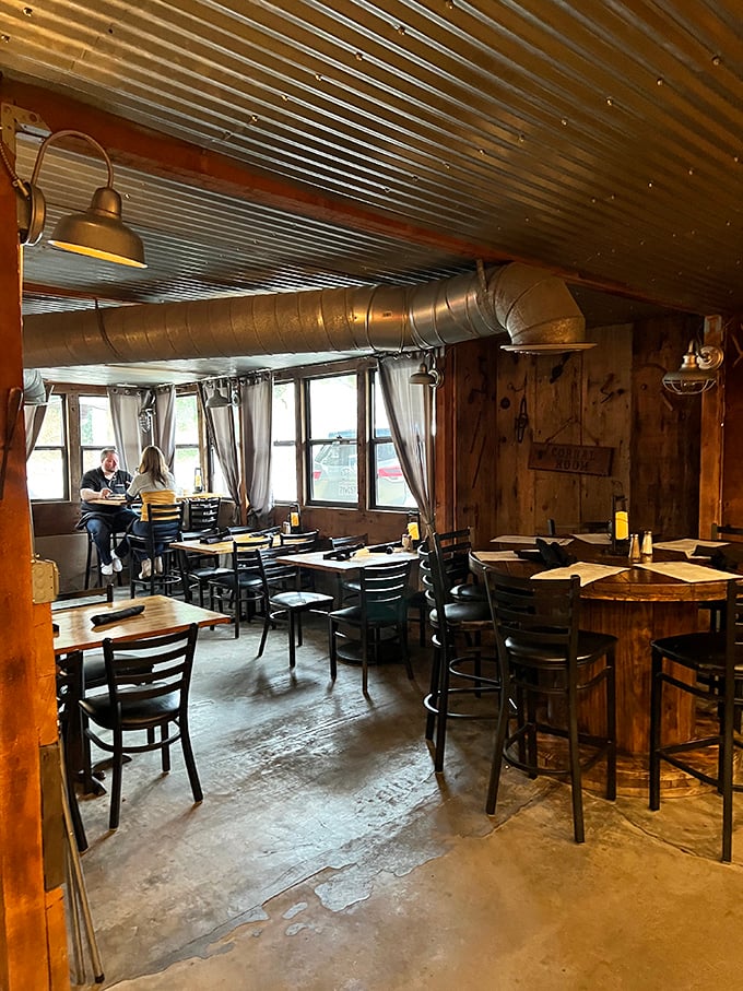 Rustic charm meets serious steak business. The corrugated metal ceiling and wooden walls create the perfect backdrop for meat-induced happiness.