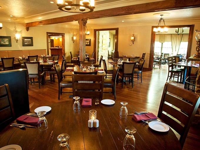 Warm wood beams frame a dining room where memories are made. This isn't just dinner—it's the backdrop for anniversaries and first dates alike.