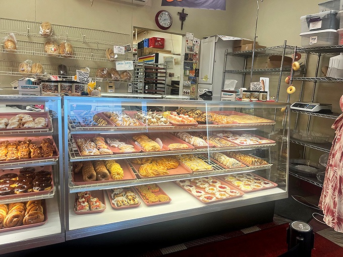 Pastry paradise awaits! The display cases at Kiedrowski's are like a museum where everything's not just beautiful, but deliciously edible too.