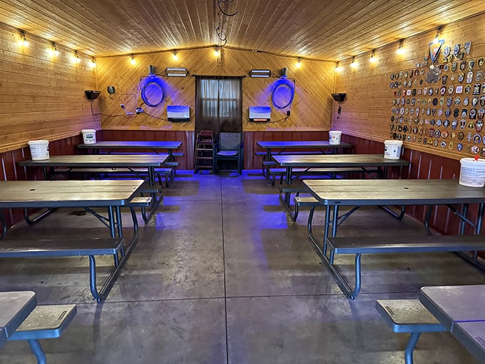 Inside, picnic tables and a wall adorned with law enforcement patches create a no-frills atmosphere where the only thing that matters is what's on your plate.