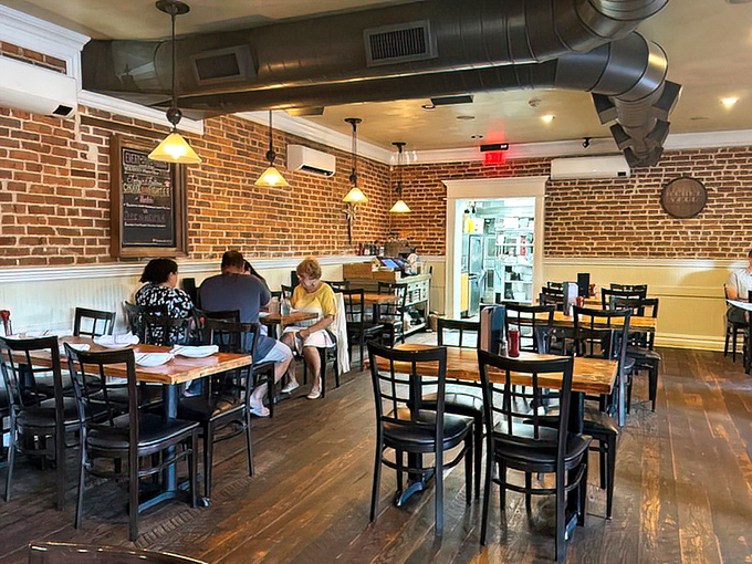 Exposed brick walls and wooden floors create that perfect "come as you are" vibe. This isn't a place for pretension—it's where flavor takes center stage.