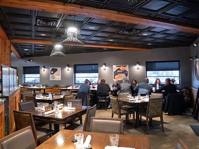 Inside, exposed wooden beams and modern lighting create that perfect "fancy but not too fancy" vibe. The kind of place where conversations flow as smoothly as the drinks.