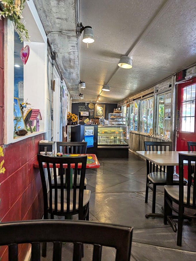 Inside, simplicity reigns supreme. No designer needed here—just honest charm with red walls, simple tables, and lighting that makes everyone look like they've just returned from vacation.