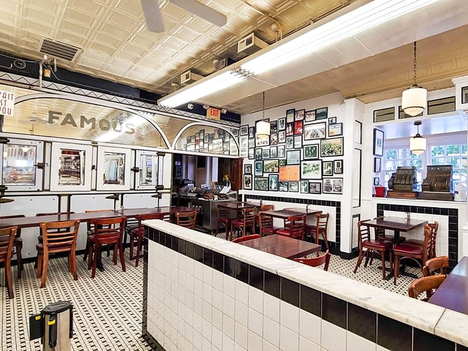 Step inside and time travels backward—classic black and white tiles, vintage ceiling, and walls of history tell you this isn't just lunch, it's a Philadelphia institution.