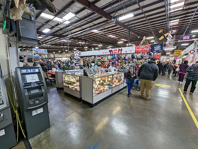 Where shopping meets spectacle—the indoor market hums with activity as shoppers navigate a maze of glass cases and vendor displays. 