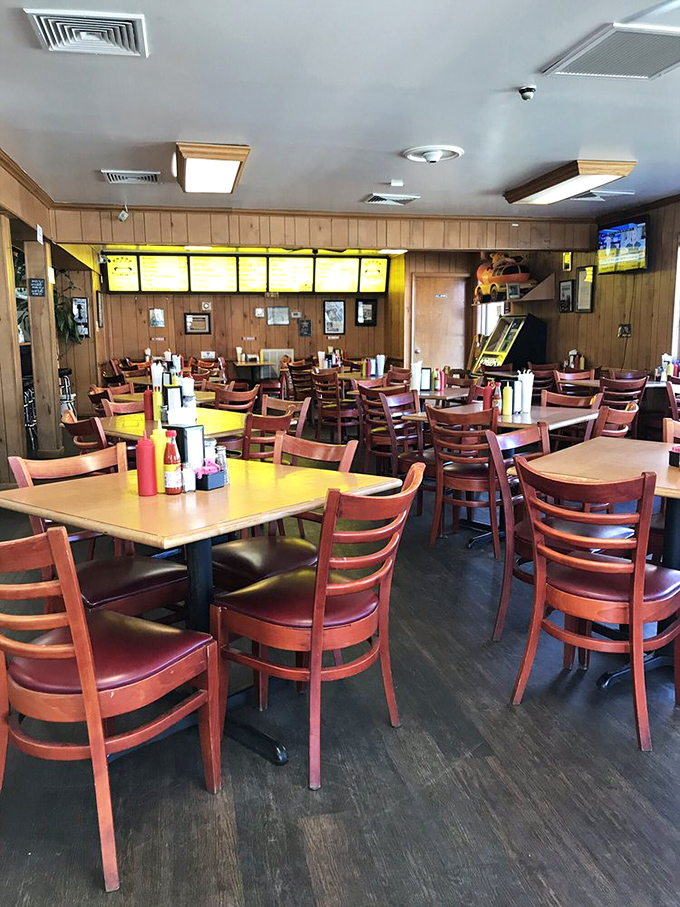 Wood paneling and ladder-back chairs aren't trendy; they're timeless. This dining room has witnessed more happy meals than a fast-food clown could ever dream of.