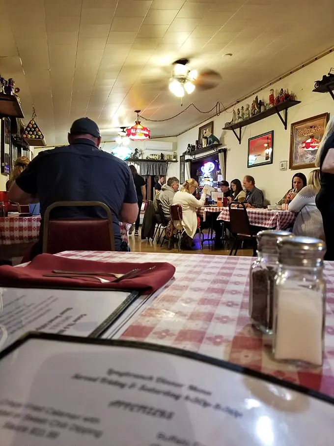 Classic red-checkered tablecloths and simple décor tell you everything: this place prioritizes what's on your plate, not what's on their walls.