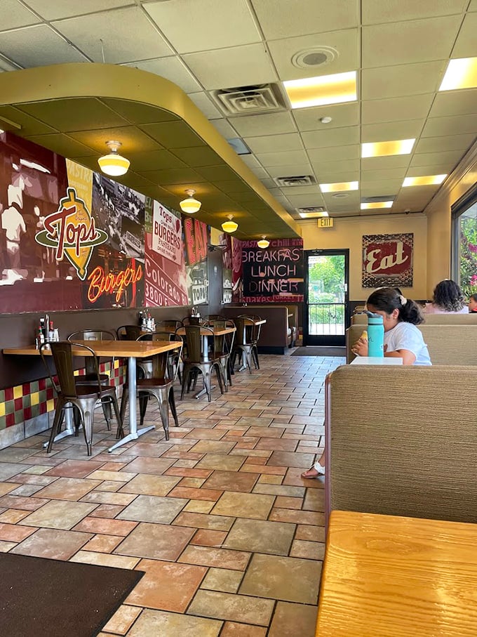 Warm earth tones, nostalgic signage, and that unmistakable diner energy. The interior feels like a time capsule where comfort food reigns supreme.