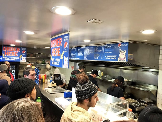 Organized chaos at its most delicious—where patience in line becomes part of the ritual and anticipation builds with every step forward.