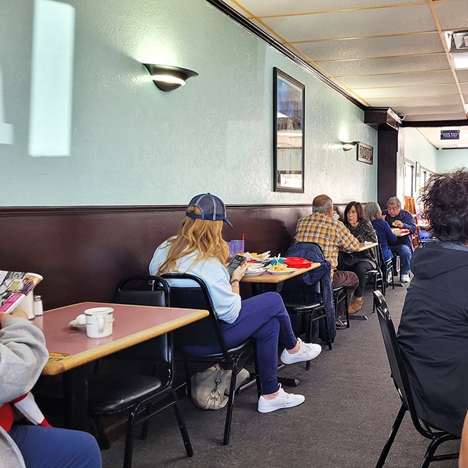 Where mint-green walls and wood paneling create a time capsule of Tex-Mex tradition. This isn't Instagram bait—it's a sanctuary for serious enchilada enthusiasts.