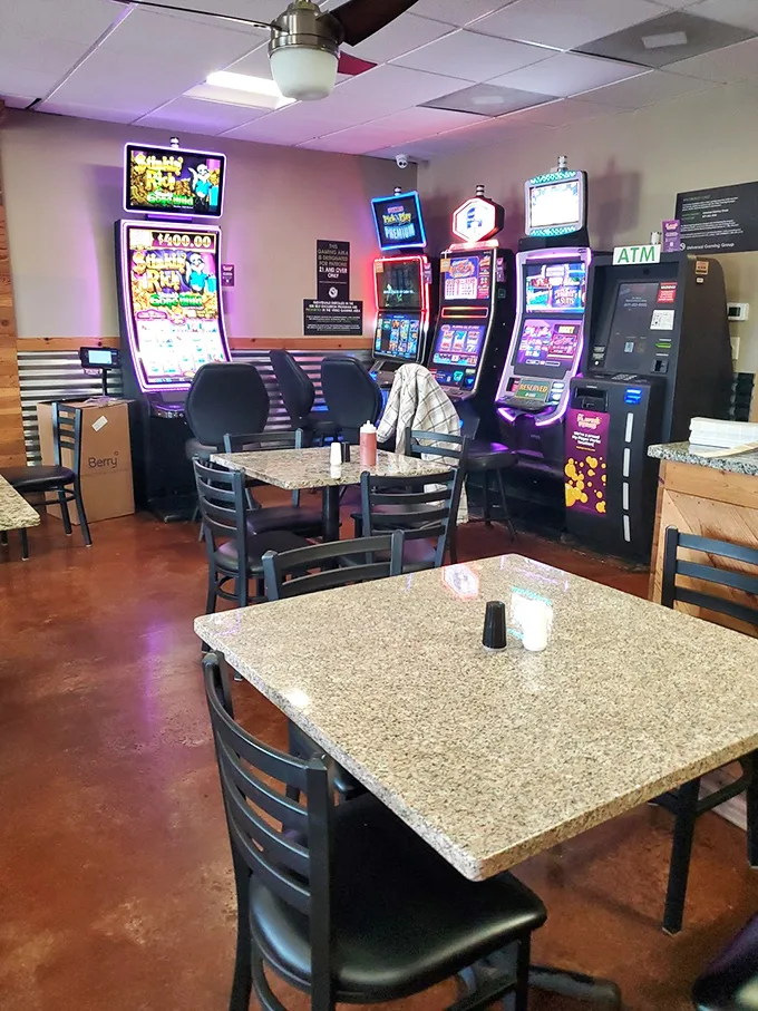 Gaming machines and simple tables create that perfect "neighborhood joint" vibe. Come for the beef, stay for one more sandwich.
