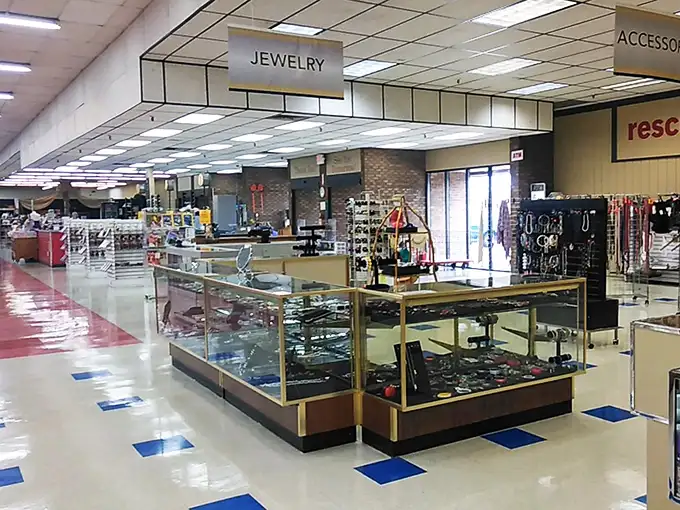 The jewelry counter gleams with possibility – one person's forgotten accessory becomes another's conversation piece. Treasure hunting at its finest.