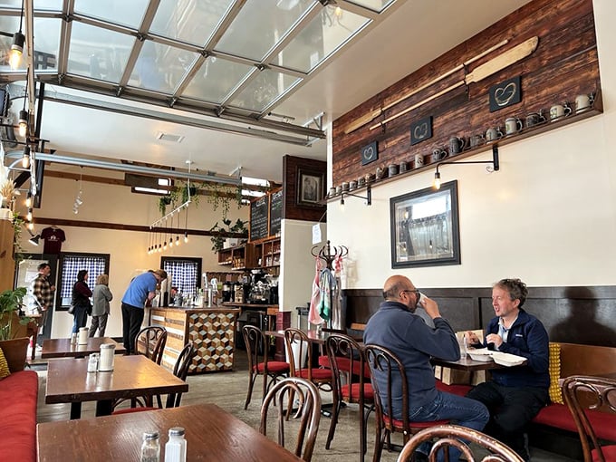 Inside, pendant lights cast a warm glow over bentwood chairs and cozy booths, creating the perfect backdrop for carb-induced euphoria.