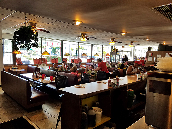 Inside Jimmy's, time stands still in the best possible way—ceiling fans lazily spinning above booths filled with locals who know where real Miami flavor lives.