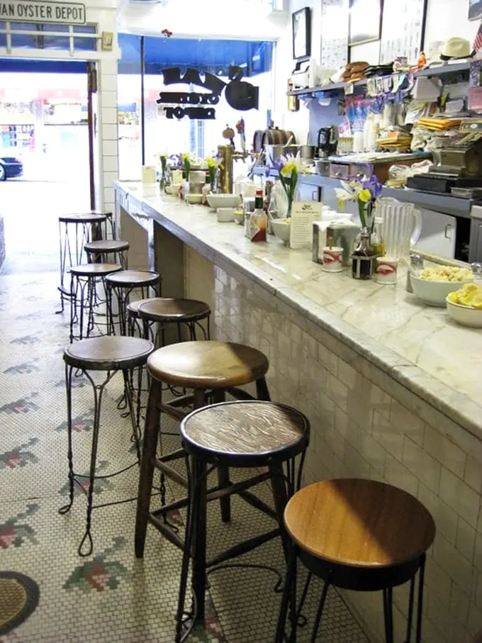 The counter-only seating isn't a design choice—it's a tradition, where strangers become friends united by the religion of fresh seafood.