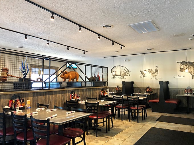 Inside, animal silhouettes watch over diners like patron saints of barbecue, while the wood-paneled walls whisper smoky secrets of perfectly cooked meats.