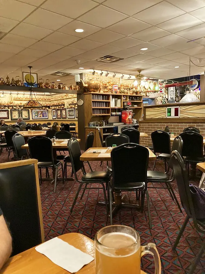 Step inside and you're transported to the golden age of Italian-American dining, where red-checkered patterns and copper kettles aren't kitsch—they're home.