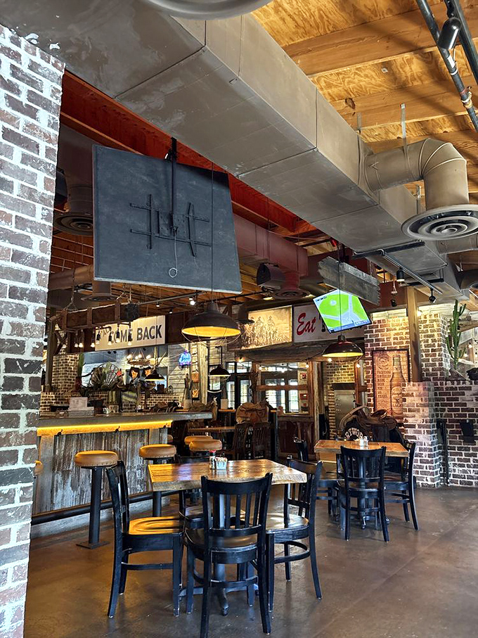 Industrial meets cozy in this thoughtfully designed interior. The "Y'all Come Back" sign isn't just decoration—it's a prediction.