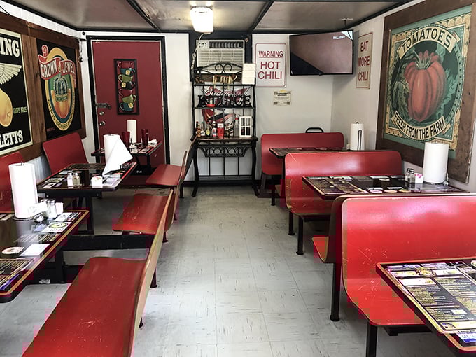 Inside, red vinyl booths and vintage signs aren't retro by design—they're authentic by survival. This place was keeping it real before keeping it real was a thing.