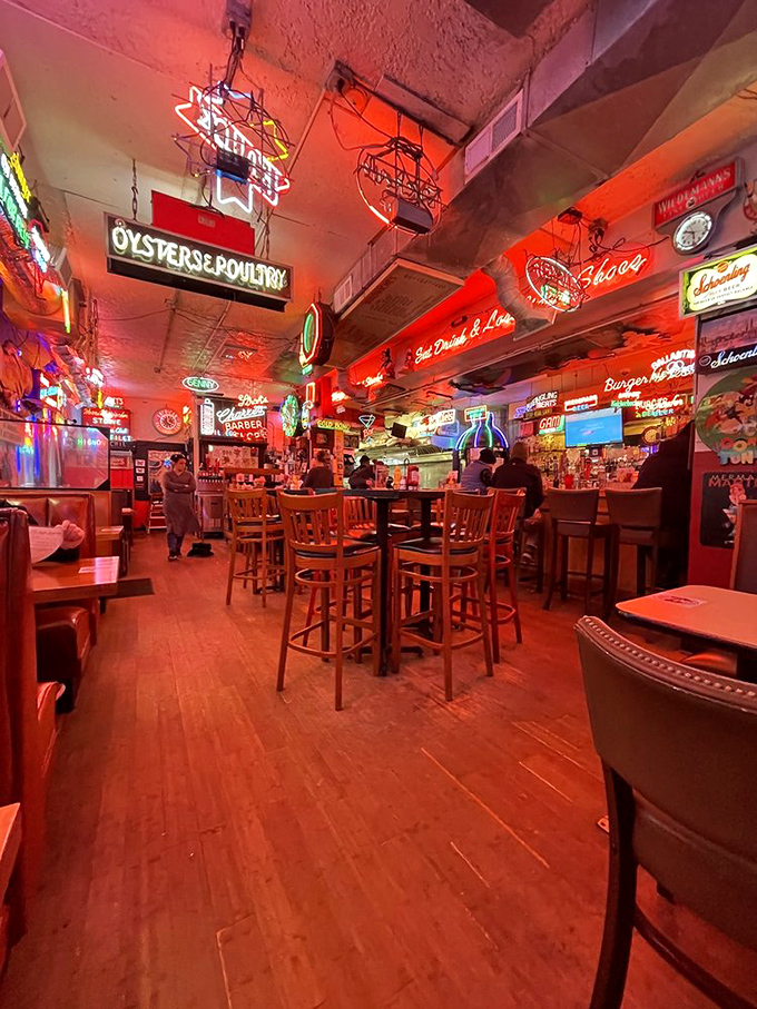 Neon heaven awaits inside, where decades of electric art create a warm glow that makes everyone look like they're having the time of their lives.