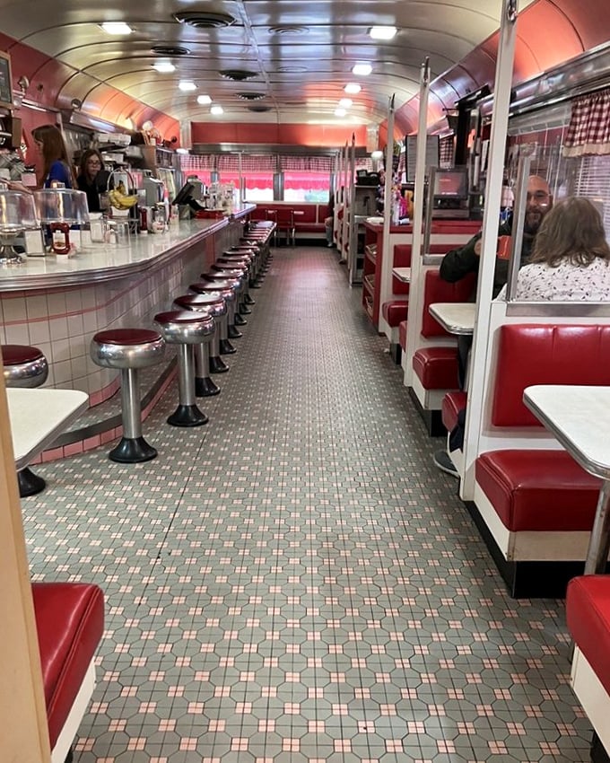 Step inside and time travel to the 1950s—red vinyl booths, chrome stools, and the promise of comfort food that makes your soul sing.