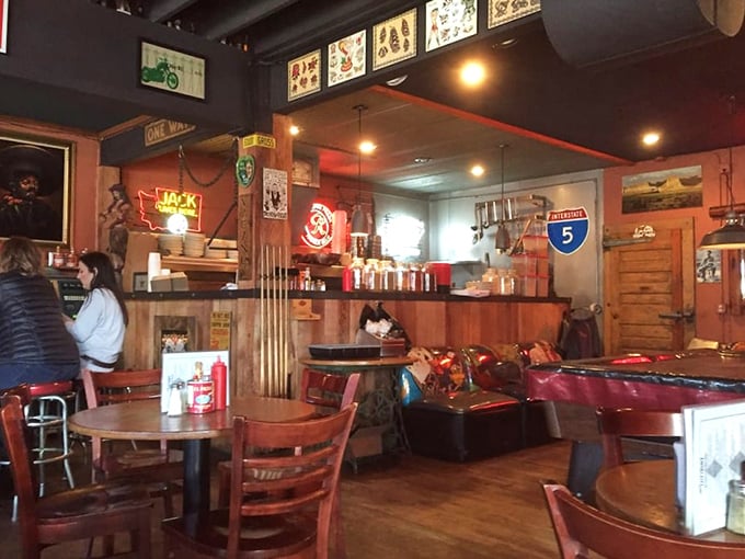 Where road signs meet comfort food. The interior feels like your favorite uncle's Texas basement—if that basement served award-winning chili and cold drinks.