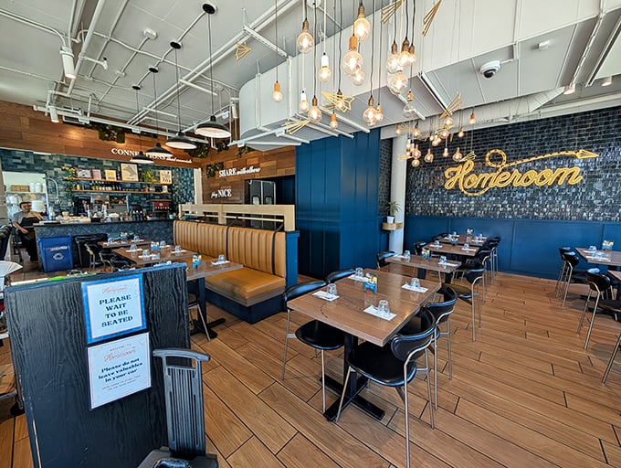Inside, school-themed nostalgia meets modern Oakland cool. Those pendant lights aren't just illuminating the space—they're spotlighting culinary magic about to happen.