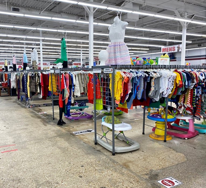 A rainbow of possibilities stretches toward the horizon. This isn't shopping—it's a treasure hunt where X marks the spot on every rack.