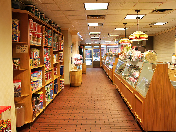 Step inside and the real magic begins – wooden shelves and glass cases creating a candy museum where willpower goes to die.