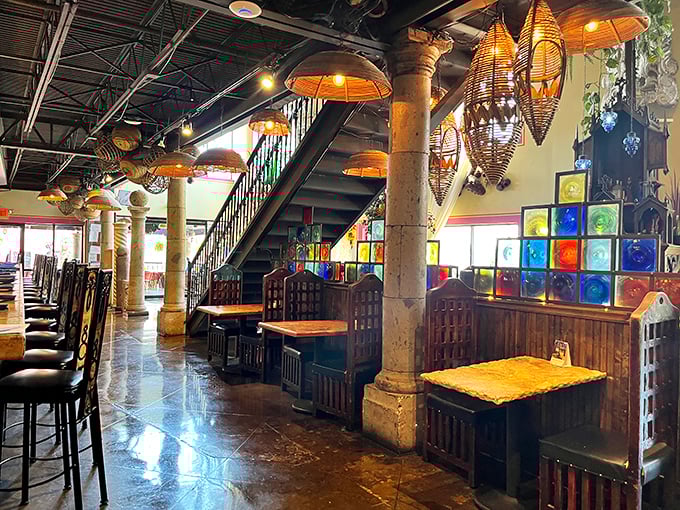 Step inside and you're transported to Mexico through a kaleidoscope of colored glass, hanging lanterns, and stone columns that whisper stories of fiestas past.