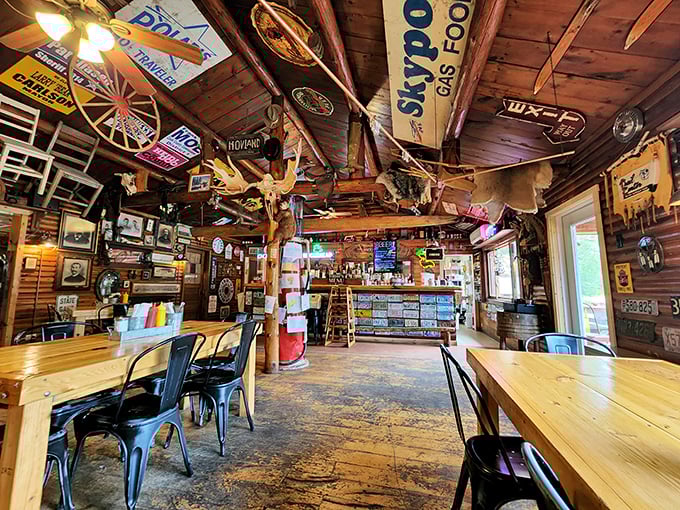 Step inside and the ceiling becomes a museum of Minnesota memories – canoes, vintage signs, and enough northwoods treasures to keep you entertained between bites.