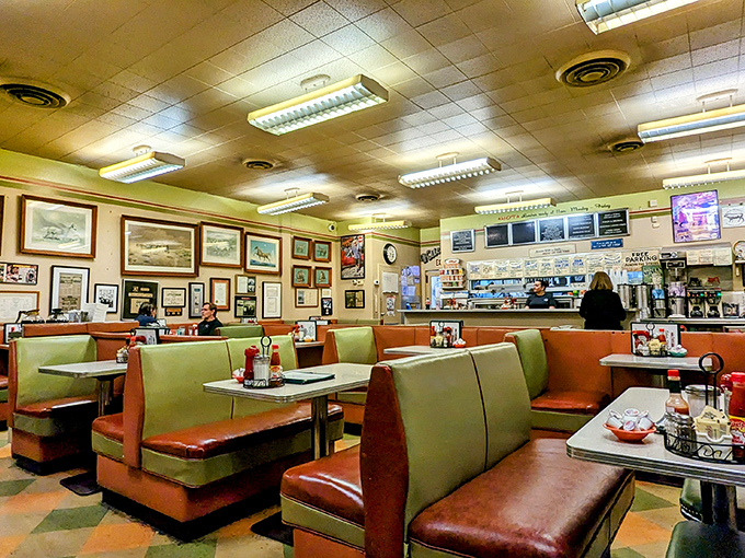 Step inside and you're transported to a simpler time—mint green booths, vintage photographs, and the unmistakable buzz of a diner that knows exactly what it's doing.