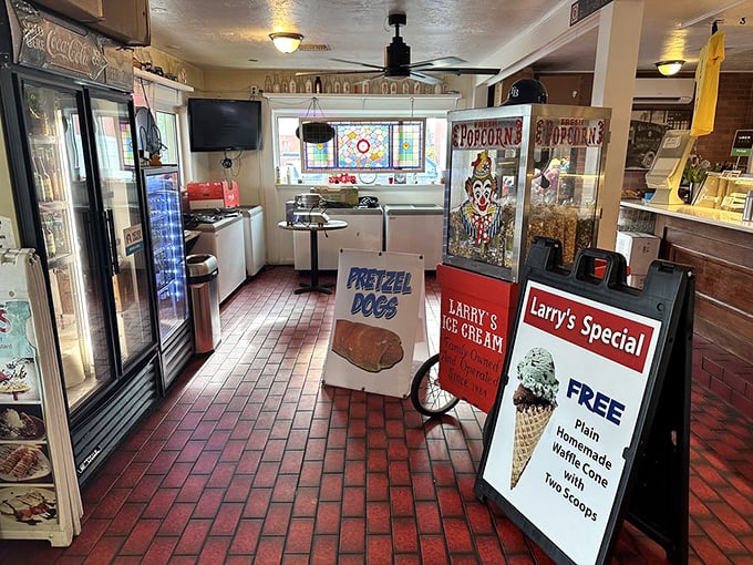 Step inside and time travel begins—red brick floors, vintage popcorn machines, and the promise of pretzel dogs create a carnival for your senses.
