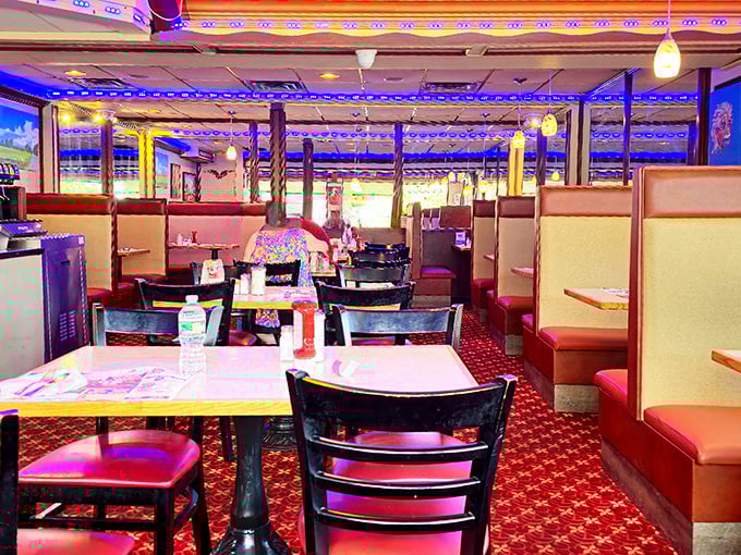 Step inside and you're transported to diner heaven – neon blue lighting, red vinyl booths, and that unmistakable feeling that breakfast can (and should) be served all day.
