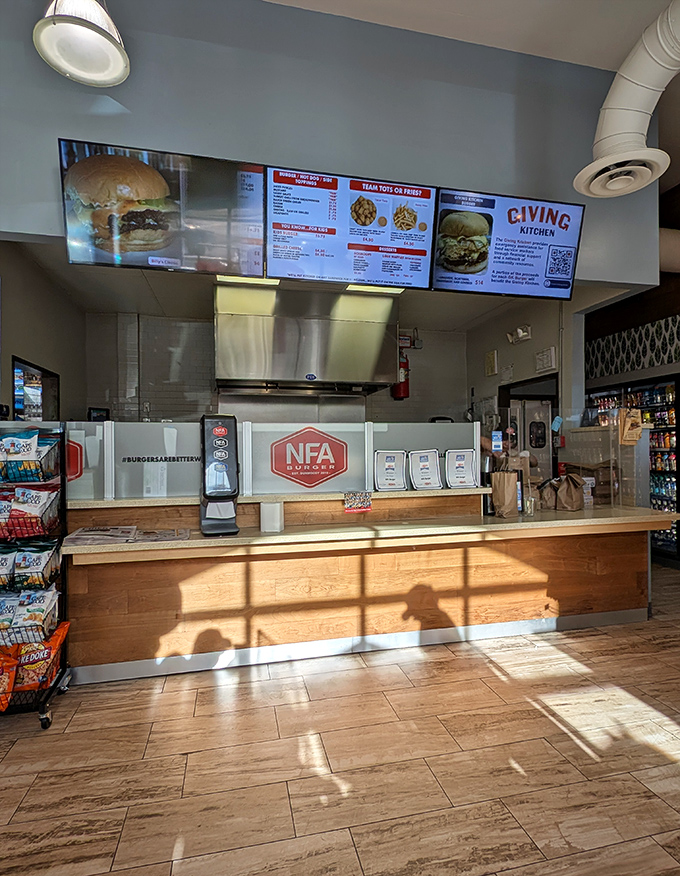 The burger command center where magic happens. No white tablecloths, no pretension—just a straightforward counter where life-changing patties are dispatched to hungry patrons.