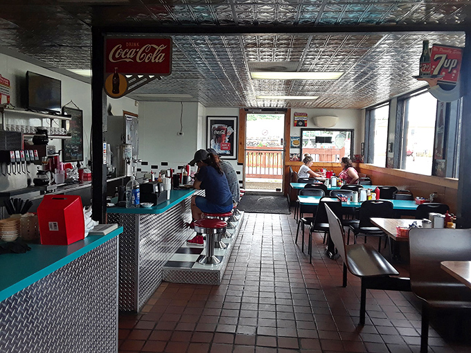 Step inside and the classic diner vibe hits you immediately – pressed tin ceiling, counter seating, and the promise of honest cooking.