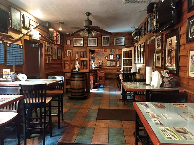 Wood-paneled walls covered in memorabilia tell stories of countless celebrations, while the barrel tables remind you what the "Barrel" in Beer Barrel Pub is all about.