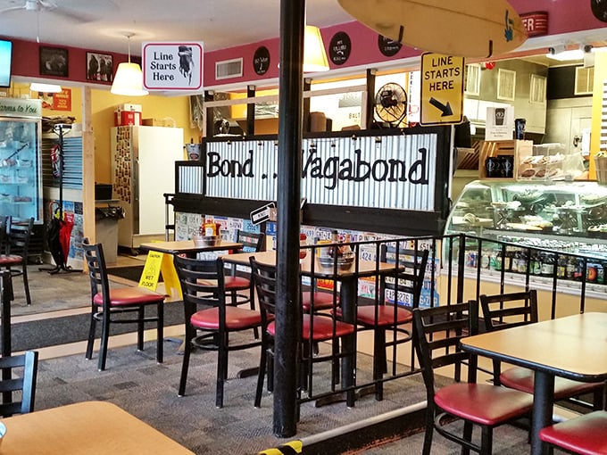 Where sandwich dreams begin. The "Line Starts Here" sign isn't just practical guidance—it's a promise of good things worth waiting for.