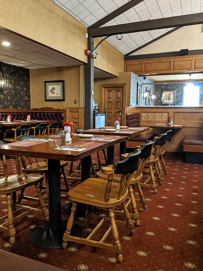 Wood paneling, sturdy chairs, and zero pretension—dining rooms like this are where food memories are born and calories don't count.