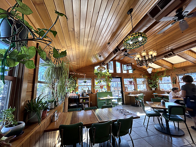 Wooden ceiling beams, hanging plants, and Tiffany-style lamps create the perfect diner atmosphere—like eating in your coolest aunt's sunroom.