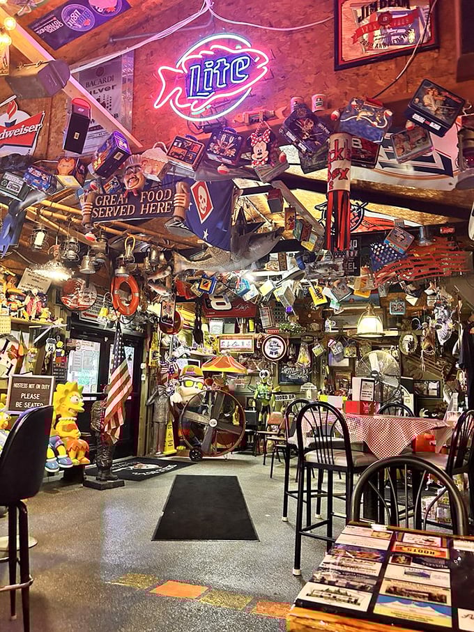 Step inside and witness what can only be described as the "Museum of Everything"—where every inch of wall and ceiling space tells a story of river life and good times.