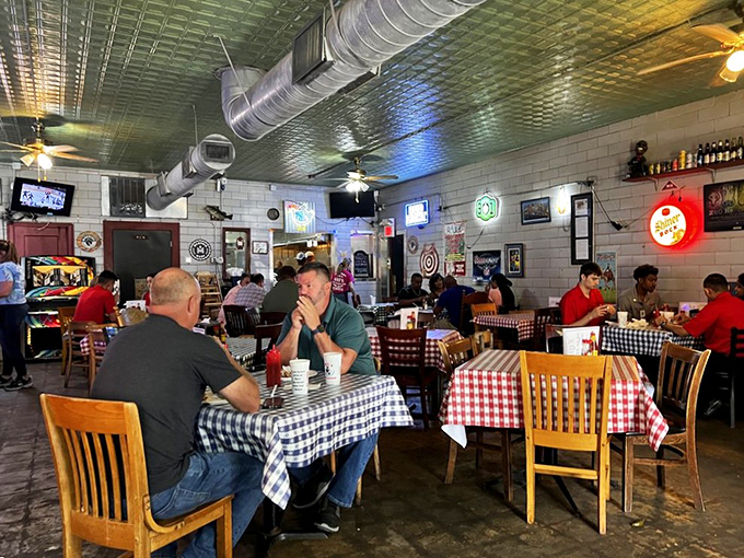 Red and white checkered tablecloths set the stage for a comfort food symphony. This isn't fine dining—it's better.