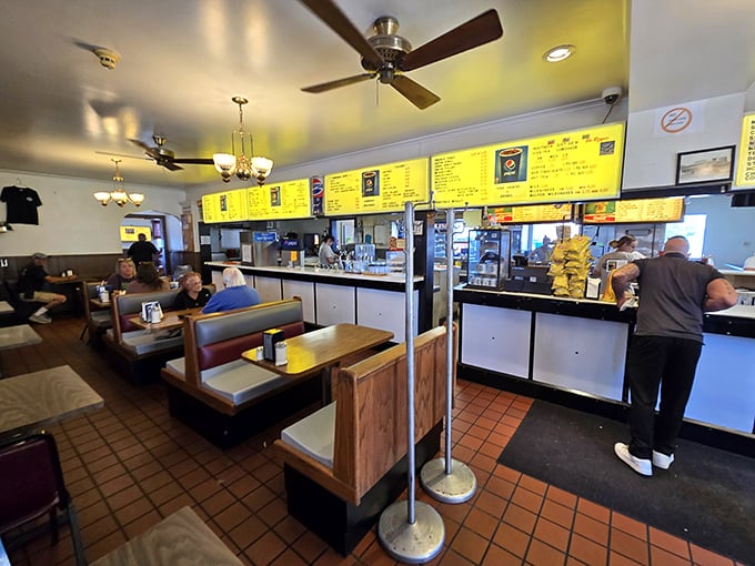 Inside Maid-Rite, the yellow menu boards and wood-paneled walls tell you you're somewhere special—somewhere that values tradition over trends.