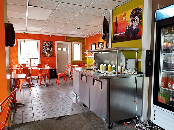 Step inside to a fiesta for your senses. The bright orange walls and casual counter service setup promise authentic flavors without pretension.r