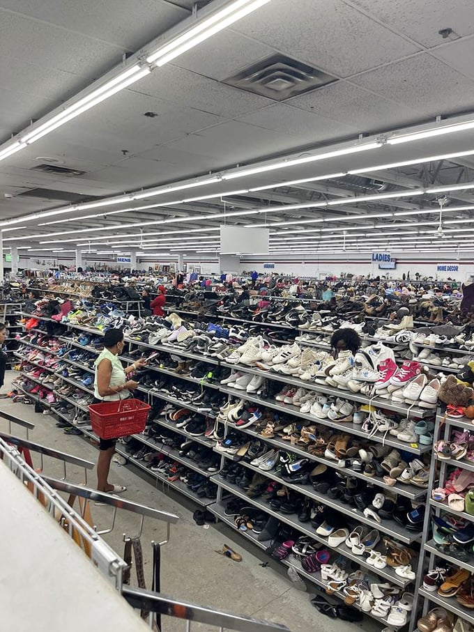 The shoe section alone could outfit Imelda Marcos twice over. Each pair tells a story—some barely worn, as if their previous owners had second thoughts immediately after purchase.