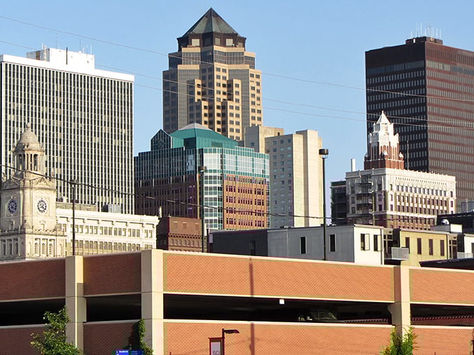 The Des Moines skyline isn't trying to intimidate you—it's more like a friendly handshake than a power move, golden in the afternoon sun.